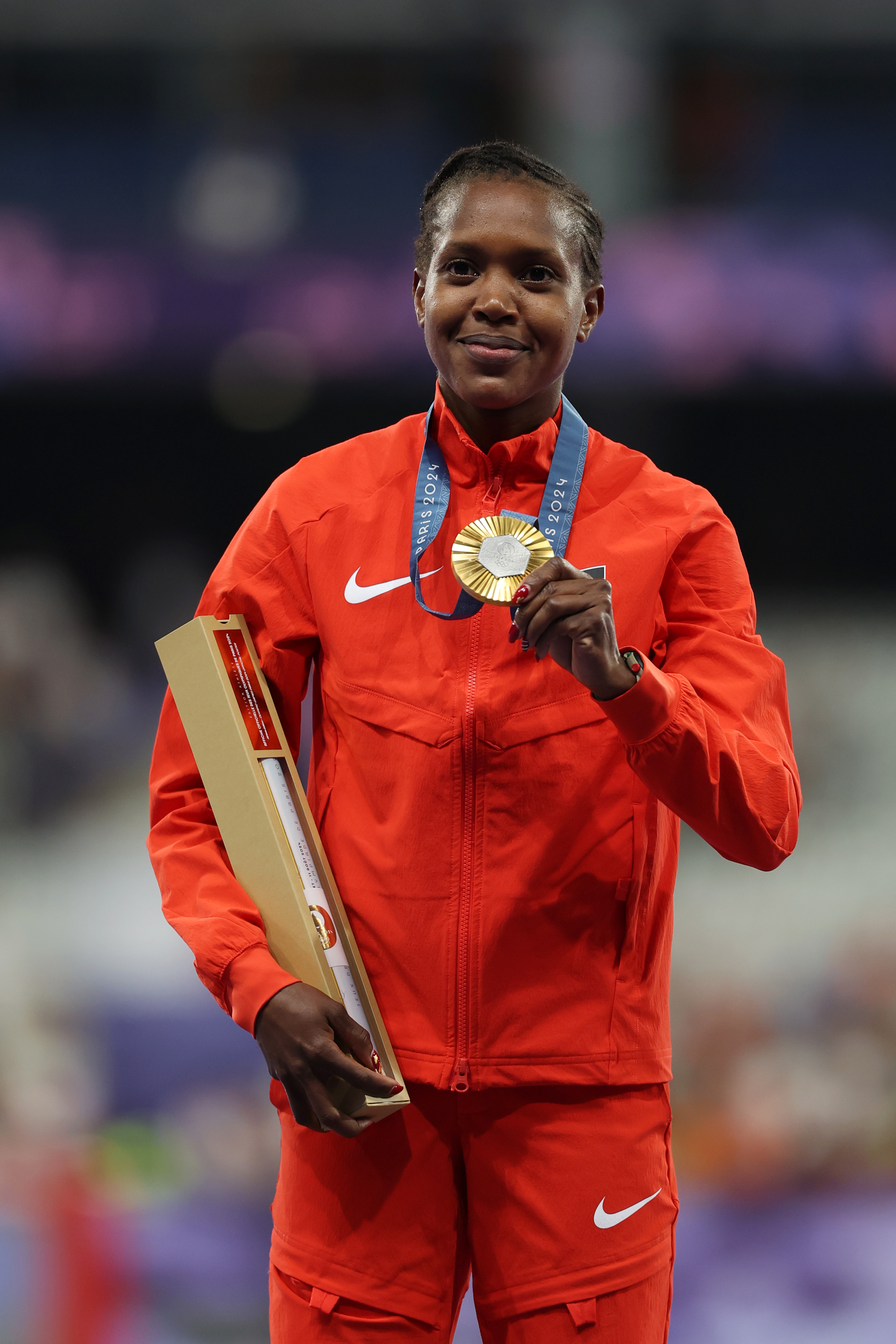 Faith Kipyegon & Her Husband, Timothy Kitum, Are A Running Power Couple