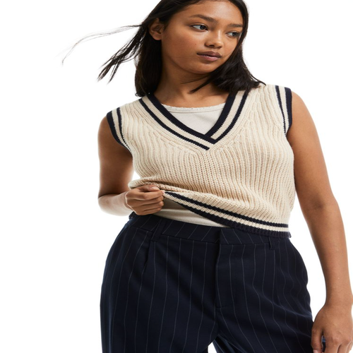 5 Cute & Effortless Ways To Style Vests In Your Fall Wardrobe